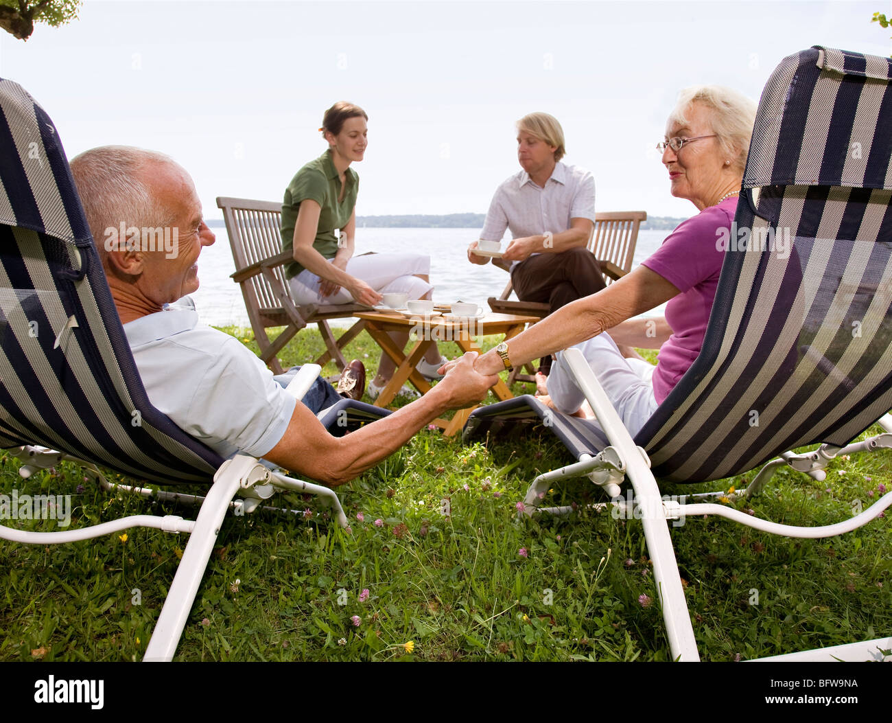 senior couple, man, woman sit together Stock Photo - Alamy