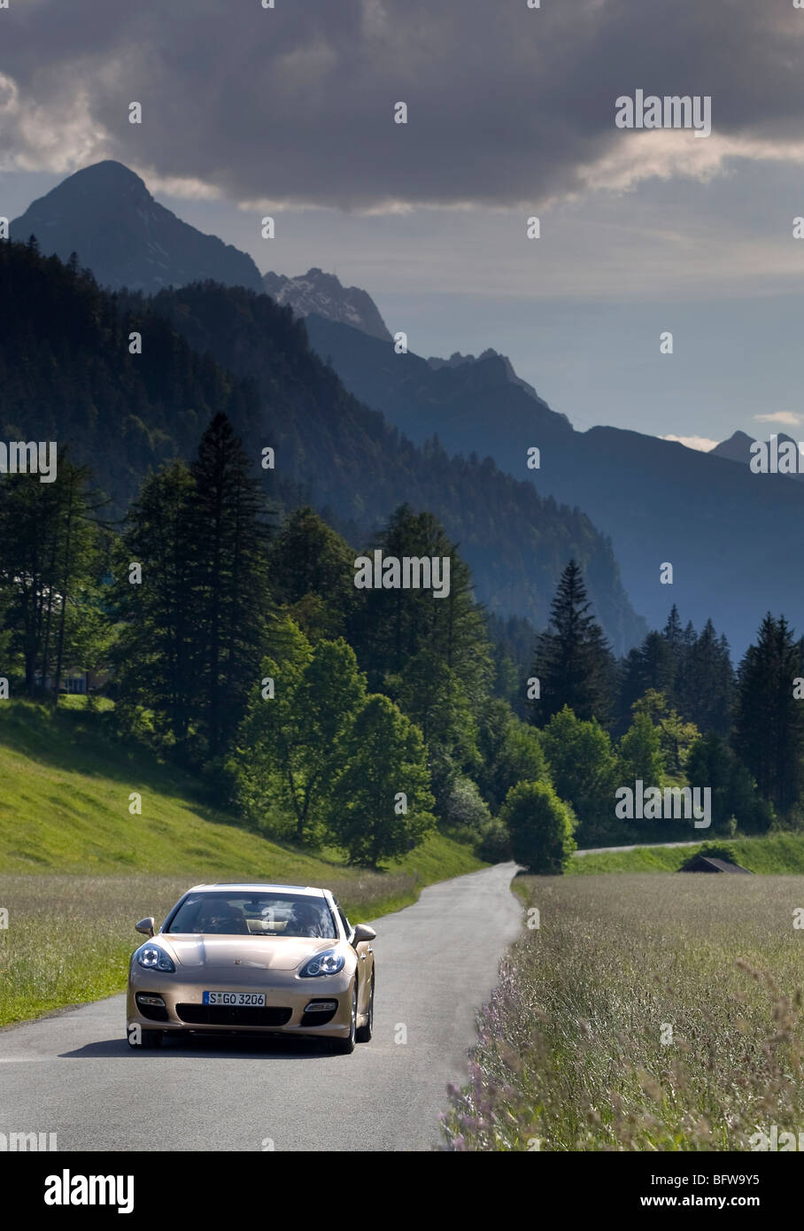 Porsche Panamerica sports saloon car driving on the road in Germany ...