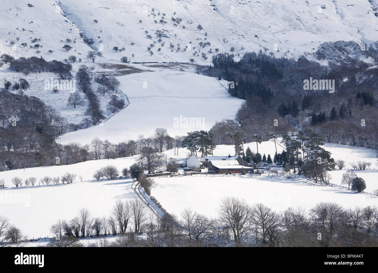 Hill farm in a snow covered landscape Stock Photo - Alamy