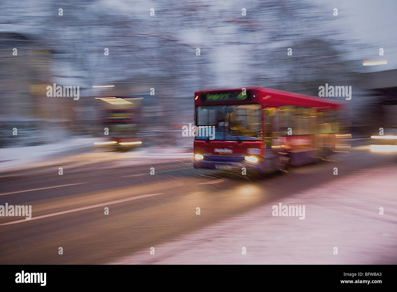 London bus driving in a snowstorm. Camden 2007 Stock Photo - Alamy