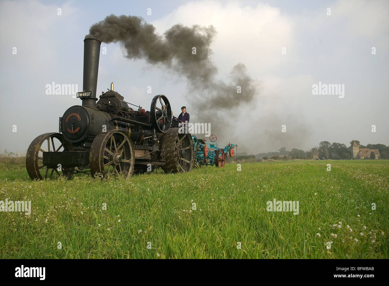 Traction Engine working in a field in Kent England Stock Photo - Alamy