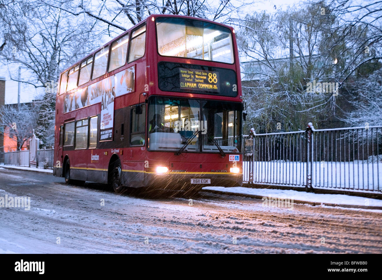 London Bus parked at bus stop in the snow. Camden London 2007 Stock ...