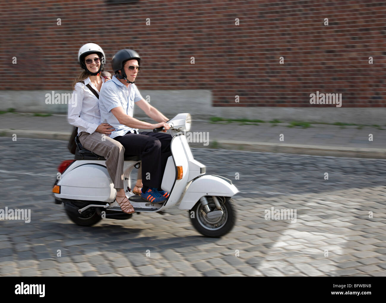 couple on scooter Stock Photo - Alamy couple on scooter Stock Photo - Alamy