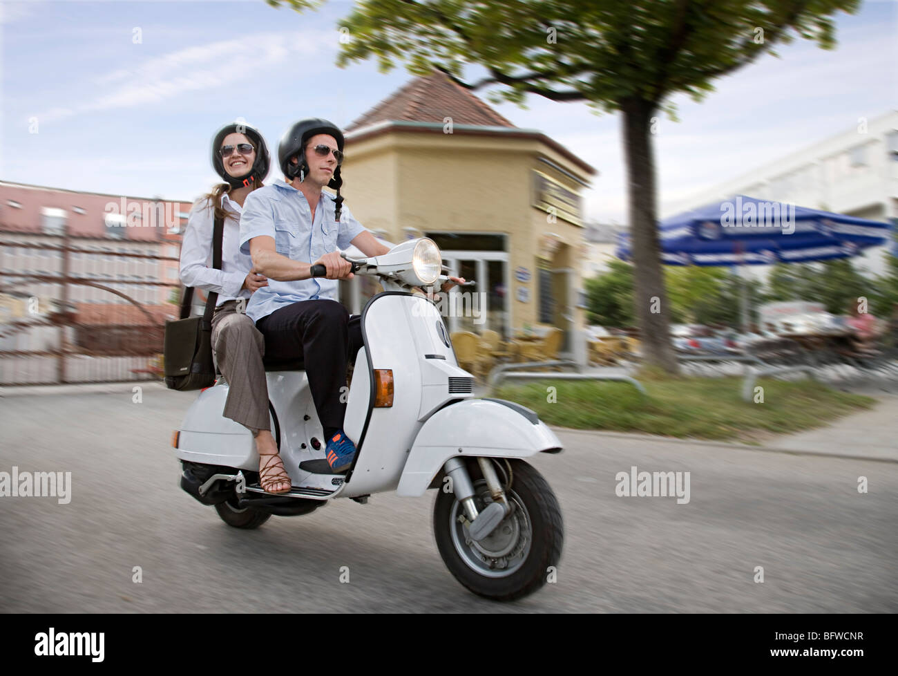couple on scooter Stock Photo - Alamy couple on scooter Stock Photo - Alamy