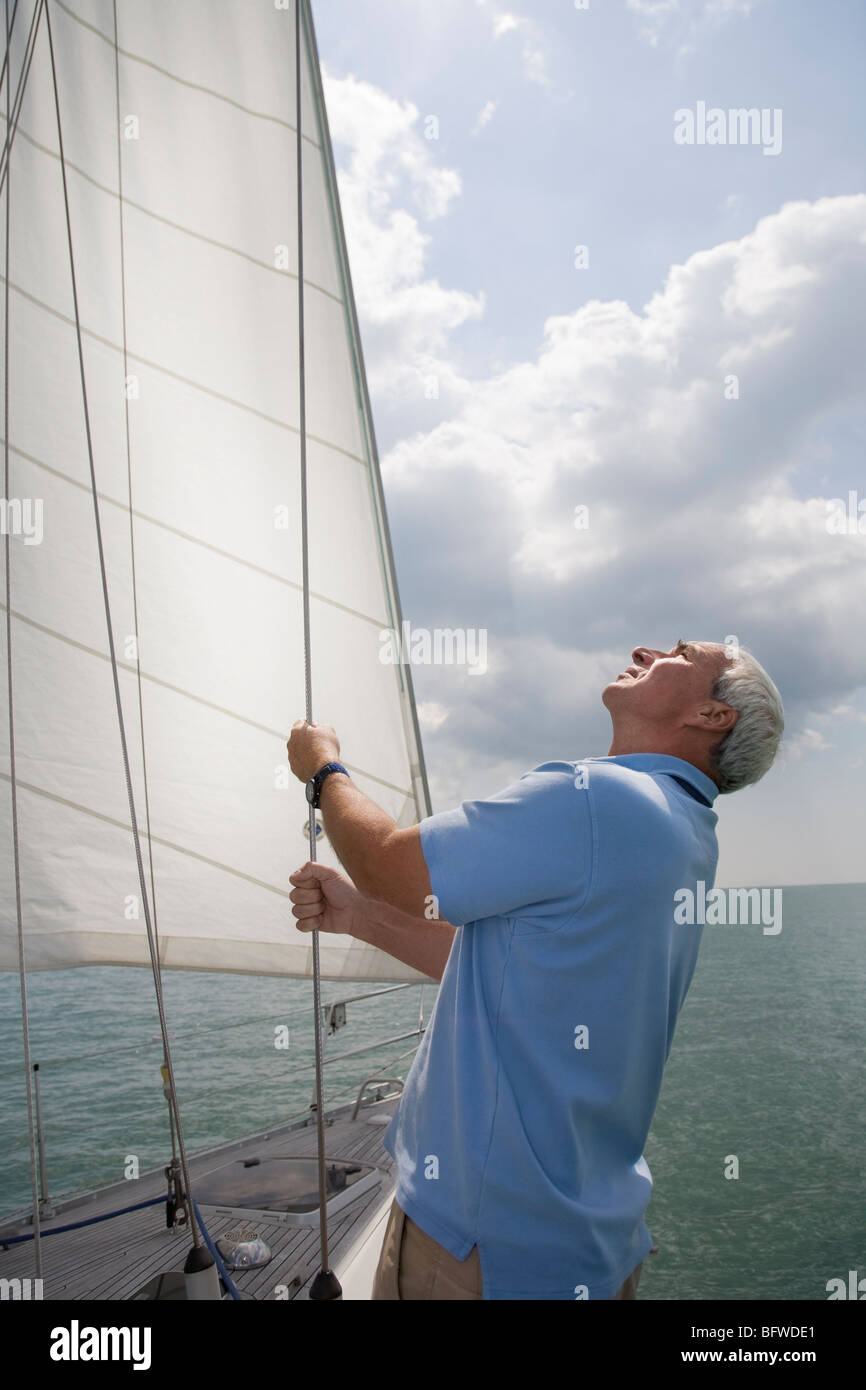 Adjusting sail hi-res stock photography and images - Alamy