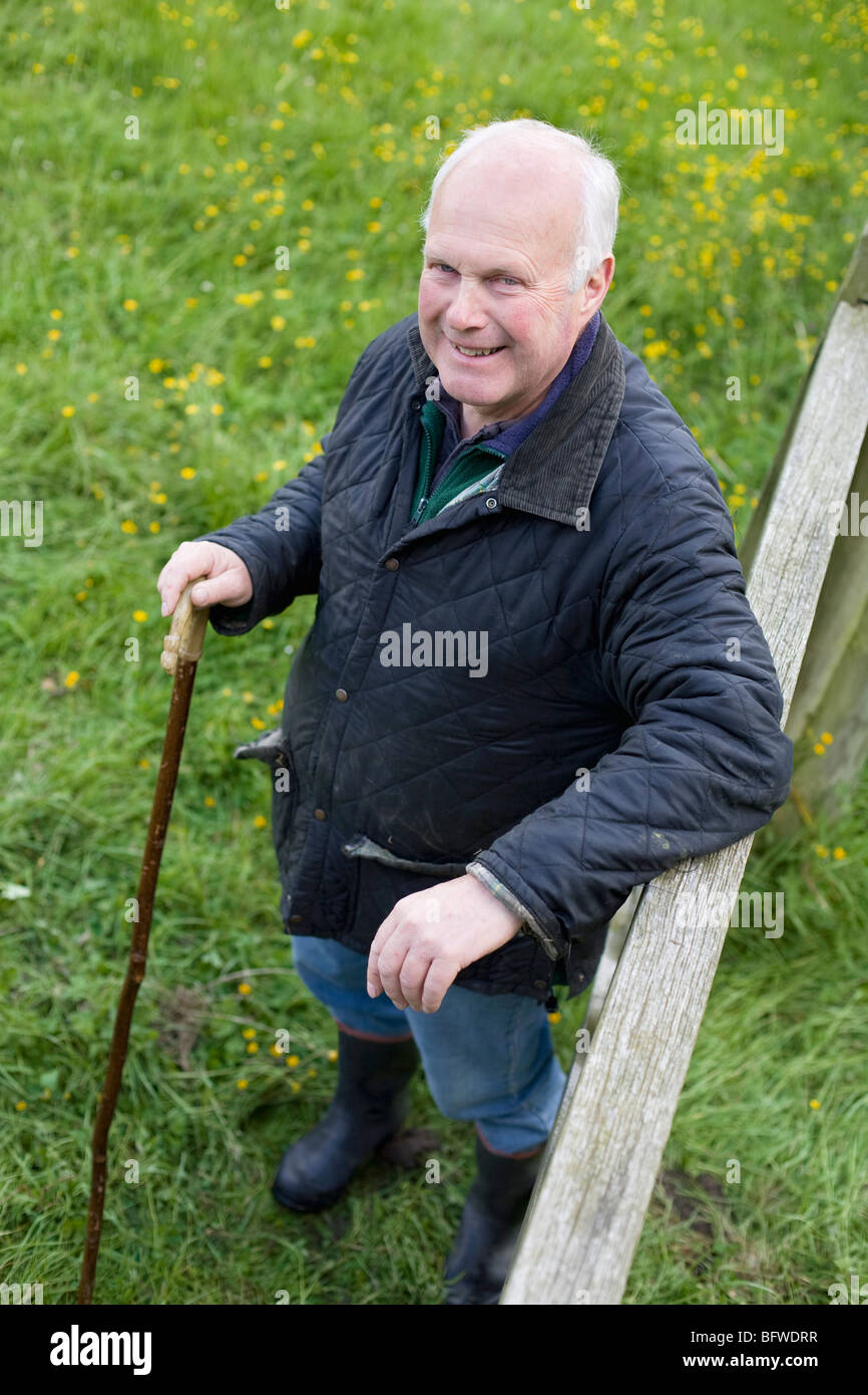 Mature man leaning on cane hi-res stock photography and images - Alamy