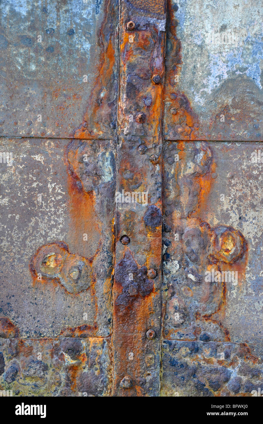 Rusty old ships plates used to reinforce quay at Hayle in Cornwall UK ...