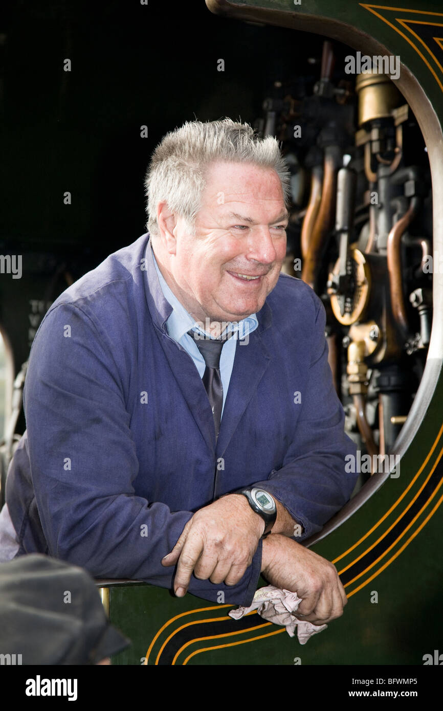 Happy steam engine driver on the North Norfolk Railway Stock Photo - Alamy