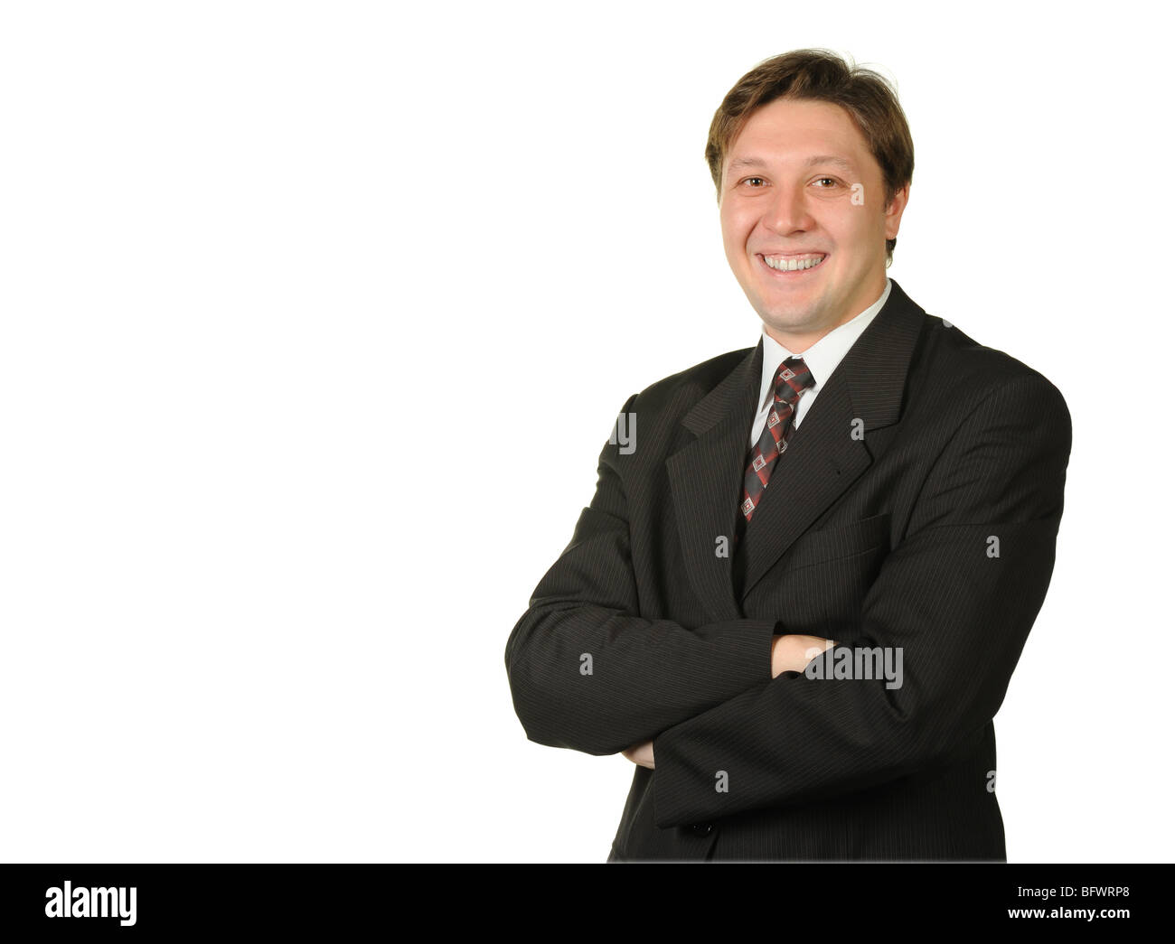 The young businessman isolated on a white background. A portrait of the ...