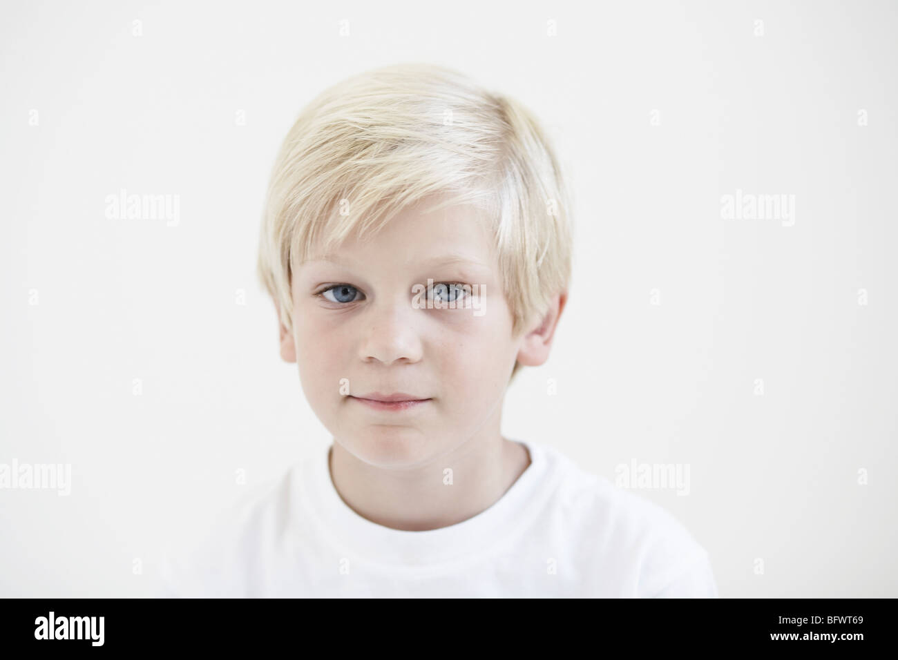 Portrait young boy looking to camera Stock Photo - Alamy