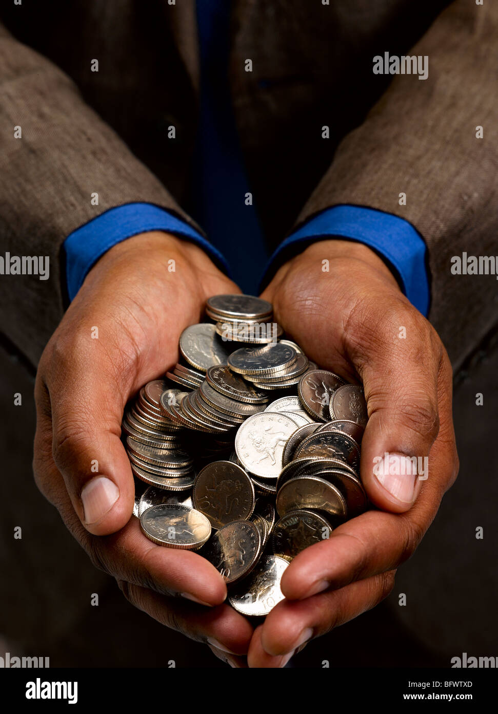 Handful Of Coins Stock Photos & Handful Of Coins Stock Images - Alamy