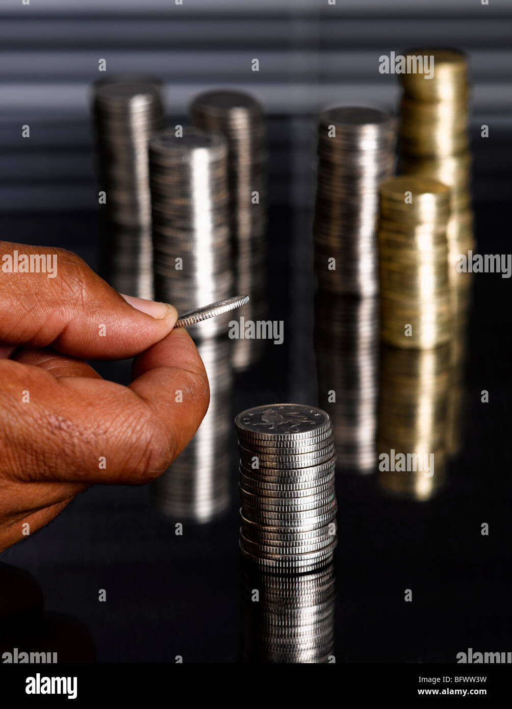 Stacking coins african hi-res stock photography and images - Alamy