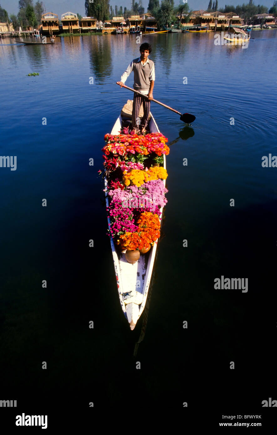 A flower vendor in his shikara boat on Lake Dal in Shrinagar Kashmir ...