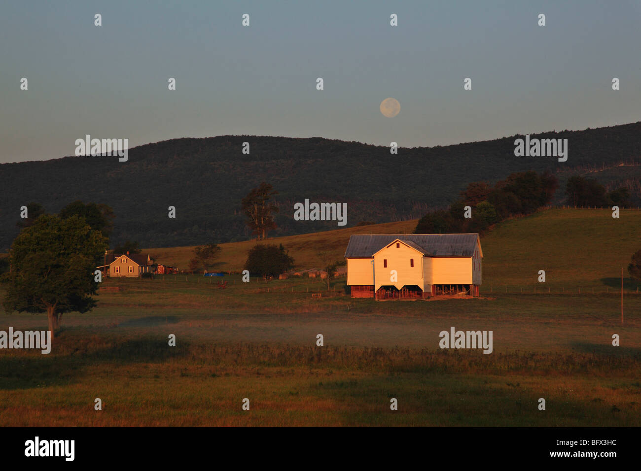 Sunrise and moon set over farm in Swoope, Shenandoah Valley, Virginia ...