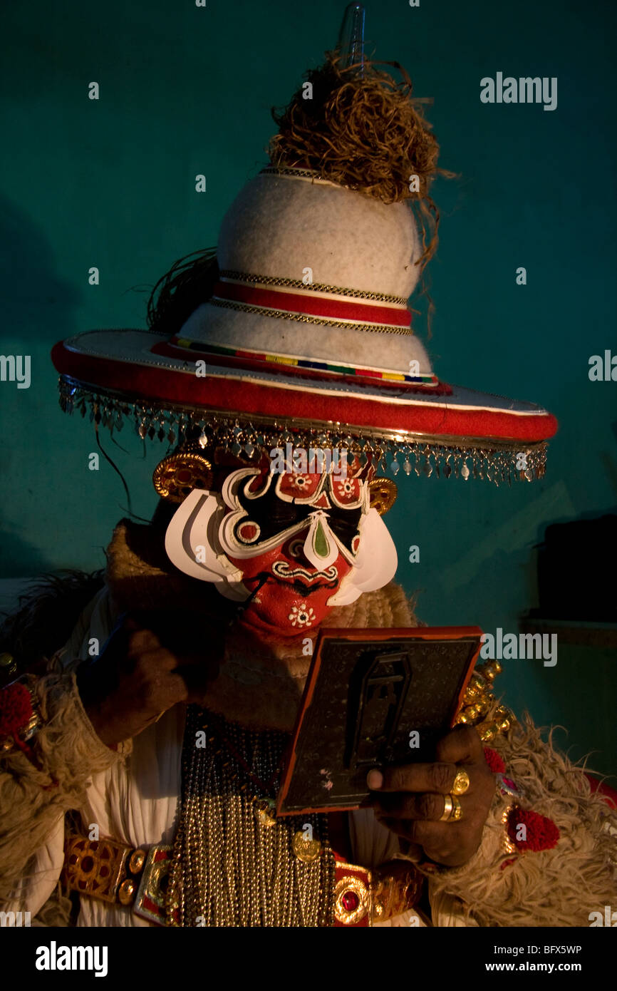Hanuman, a character in a Kathakali Story-Play, does last changes to ...
