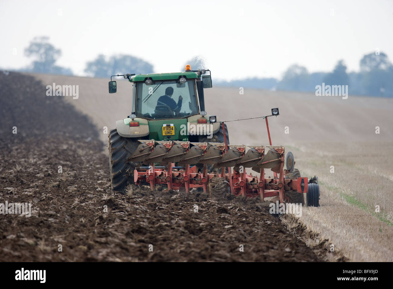 John Deere Tractor Ploughing In Rutland Stock Photo - Alamy