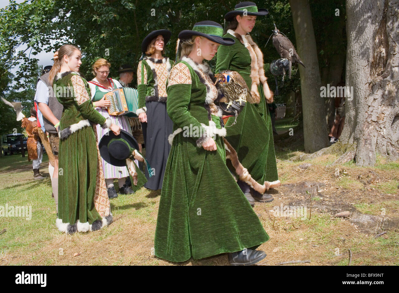 Falconry enthusiasts in traditional Austrian dress Stock Photo - Alamy