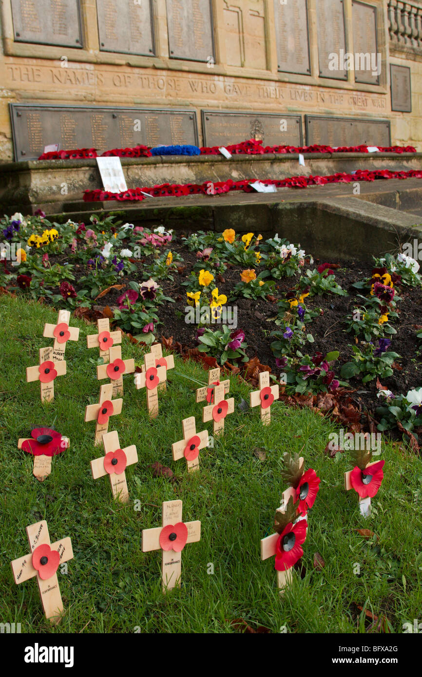 Individual crosses of remembrance in front of a war memorial Stock ...