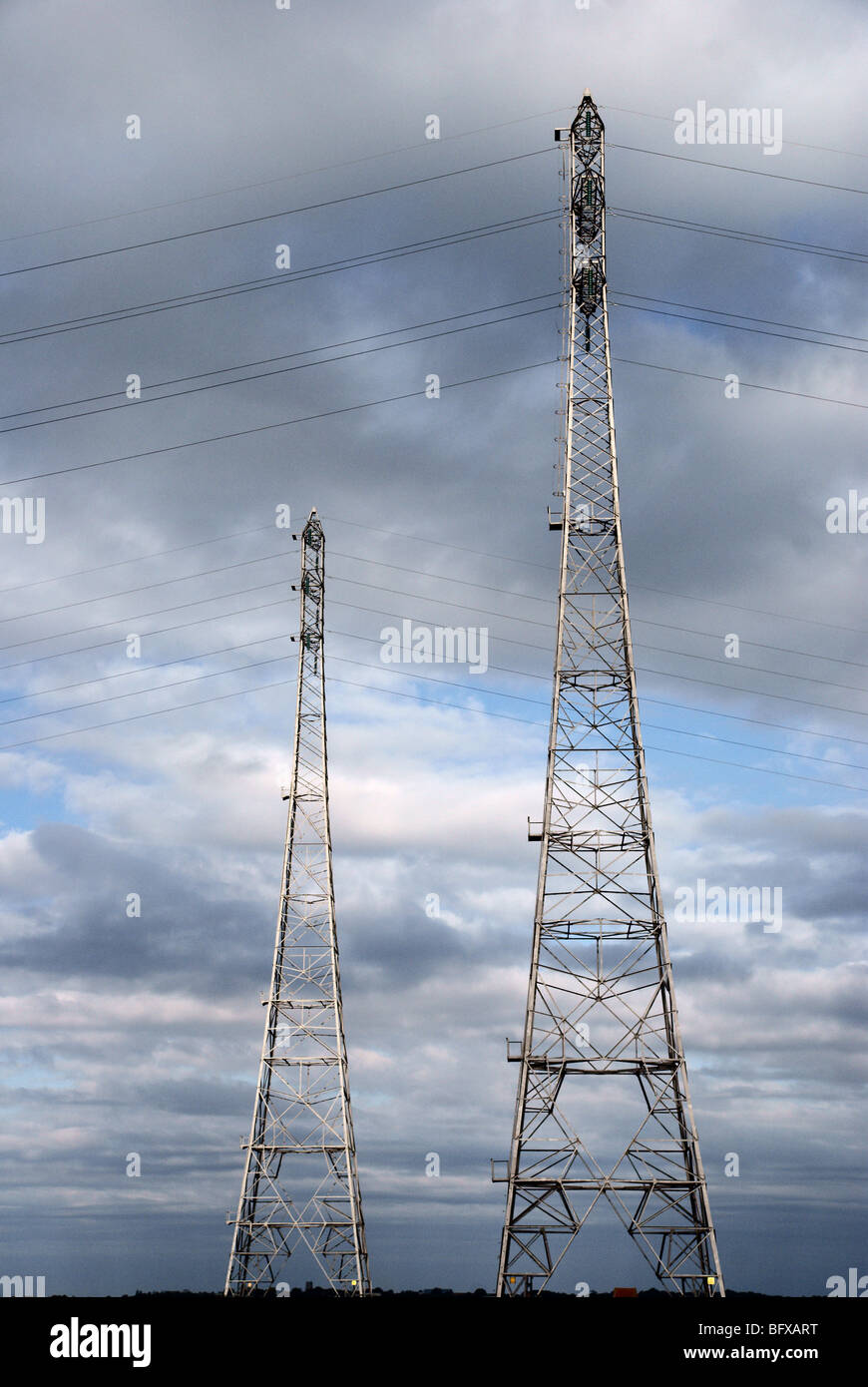 High Voltage electricity pylons Stock Photo - Alamy