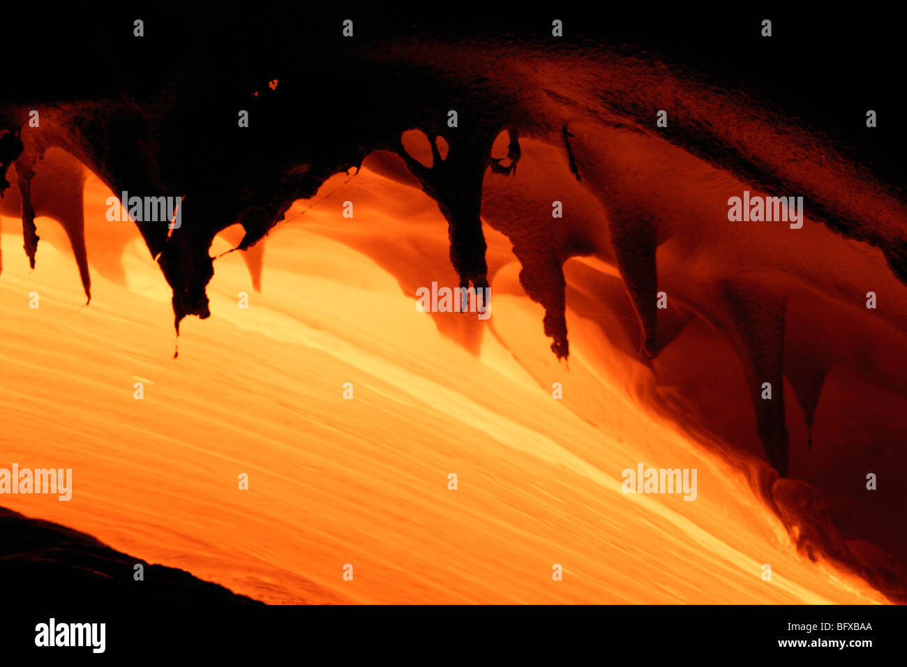 Lava tube opening, Poupou ocean entry, Hawaii Volcanoes National Park ...