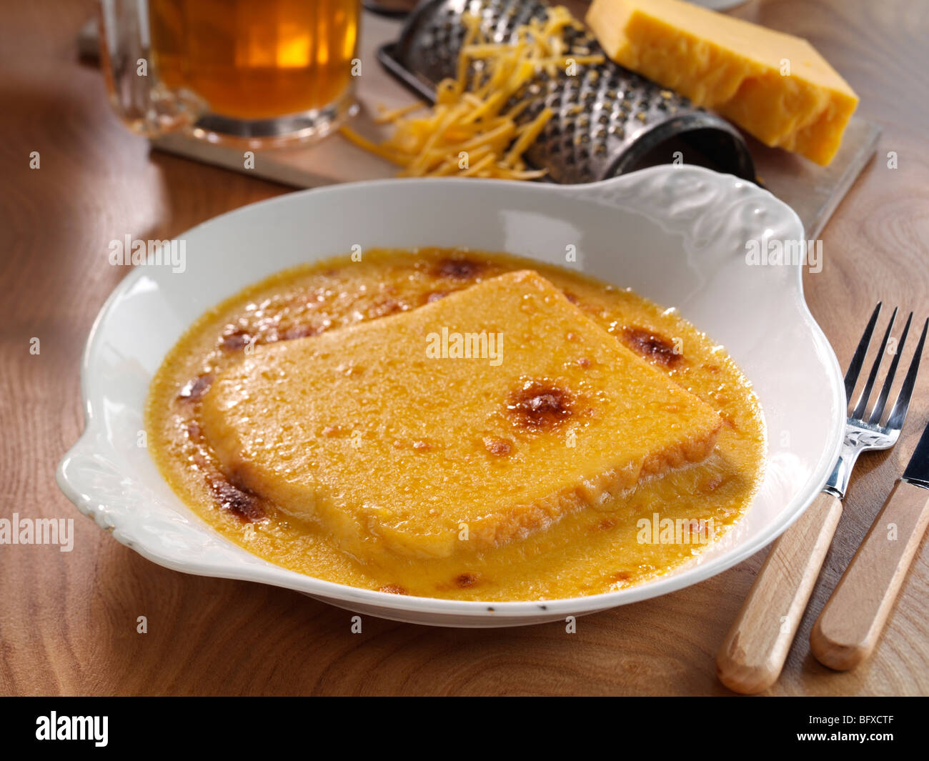 A dish of cheese rarebit Stock Photo - Alamy