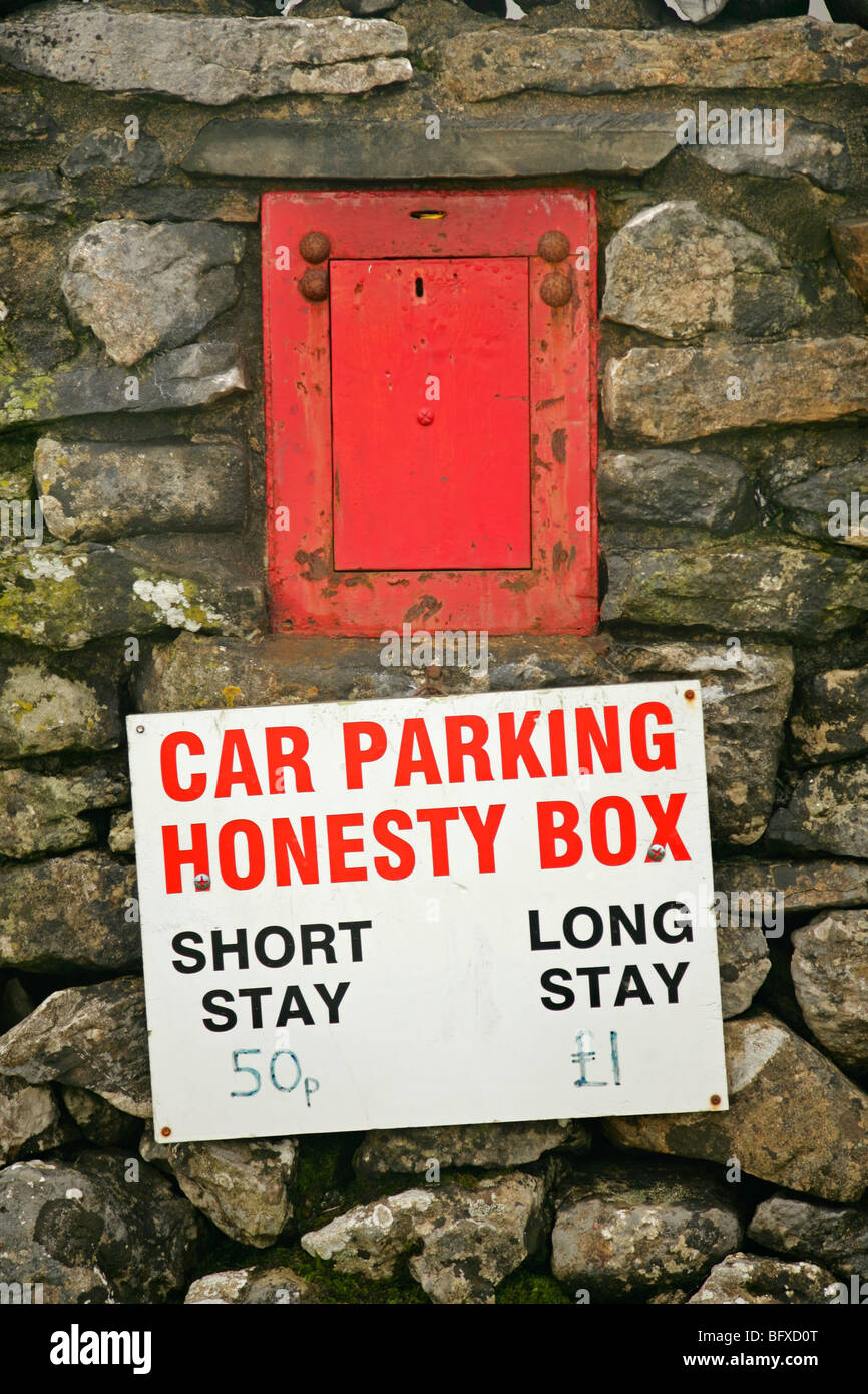 Honesty box in stone wall at long and short stay car park Stock Photo ...