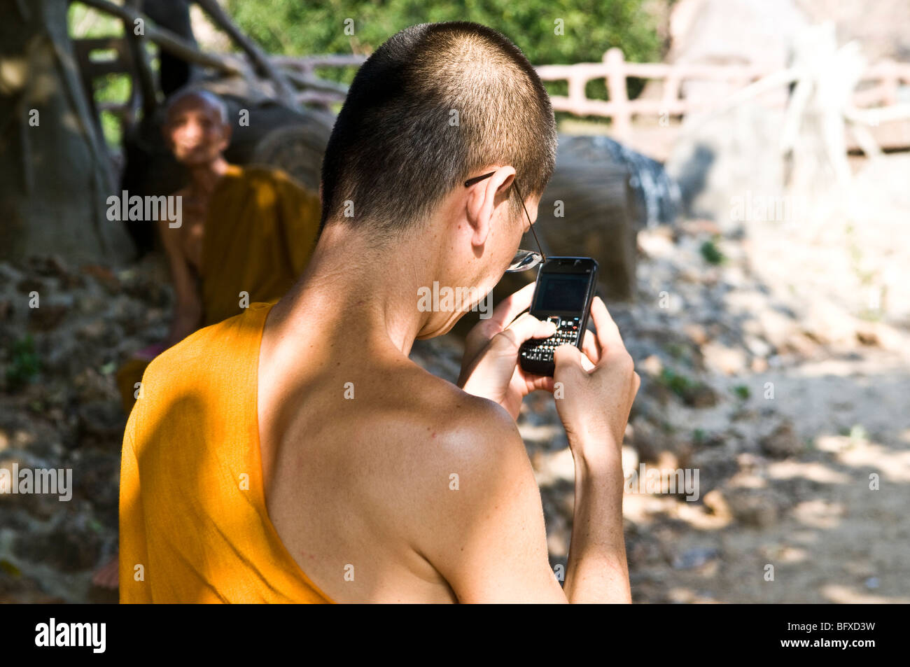 Buddhist monk phone hi-res stock photography and images - Alamy
