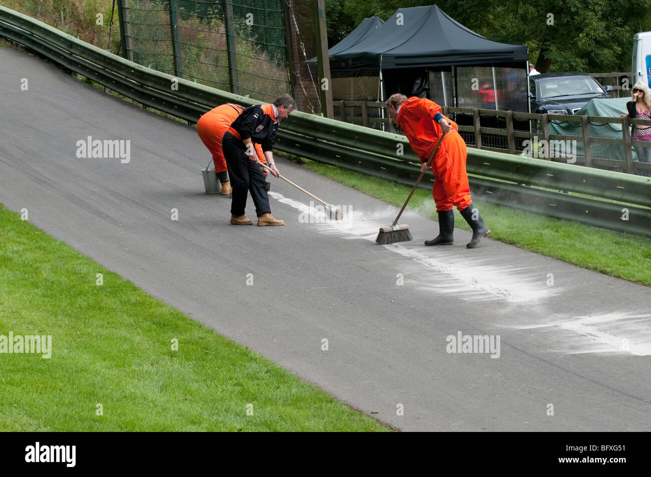 Clearing up an oil spill Stock Photo - Alamy