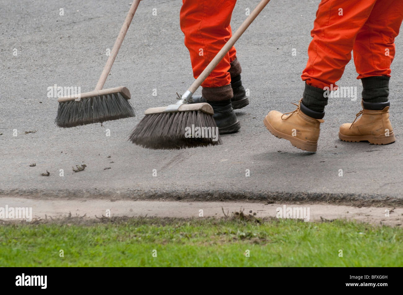 Marshalls sweeping debris off track Stock Photo - Alamy