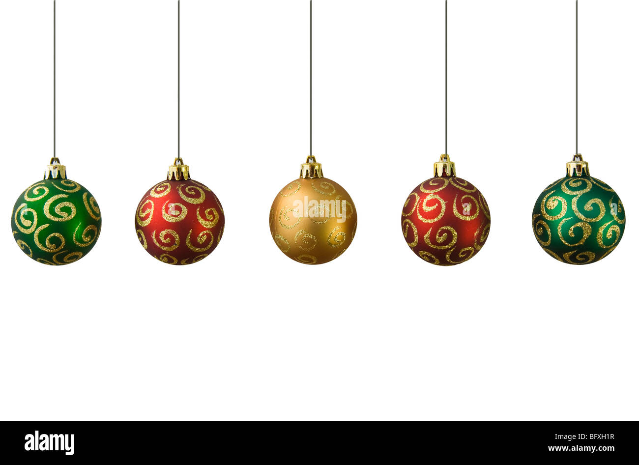 Brightly coloured sparkling and shiny new christmas baubles in a row ...