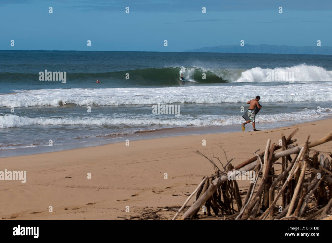 Bodyboarders on beach in water hi-res stock photography and images - Alamy