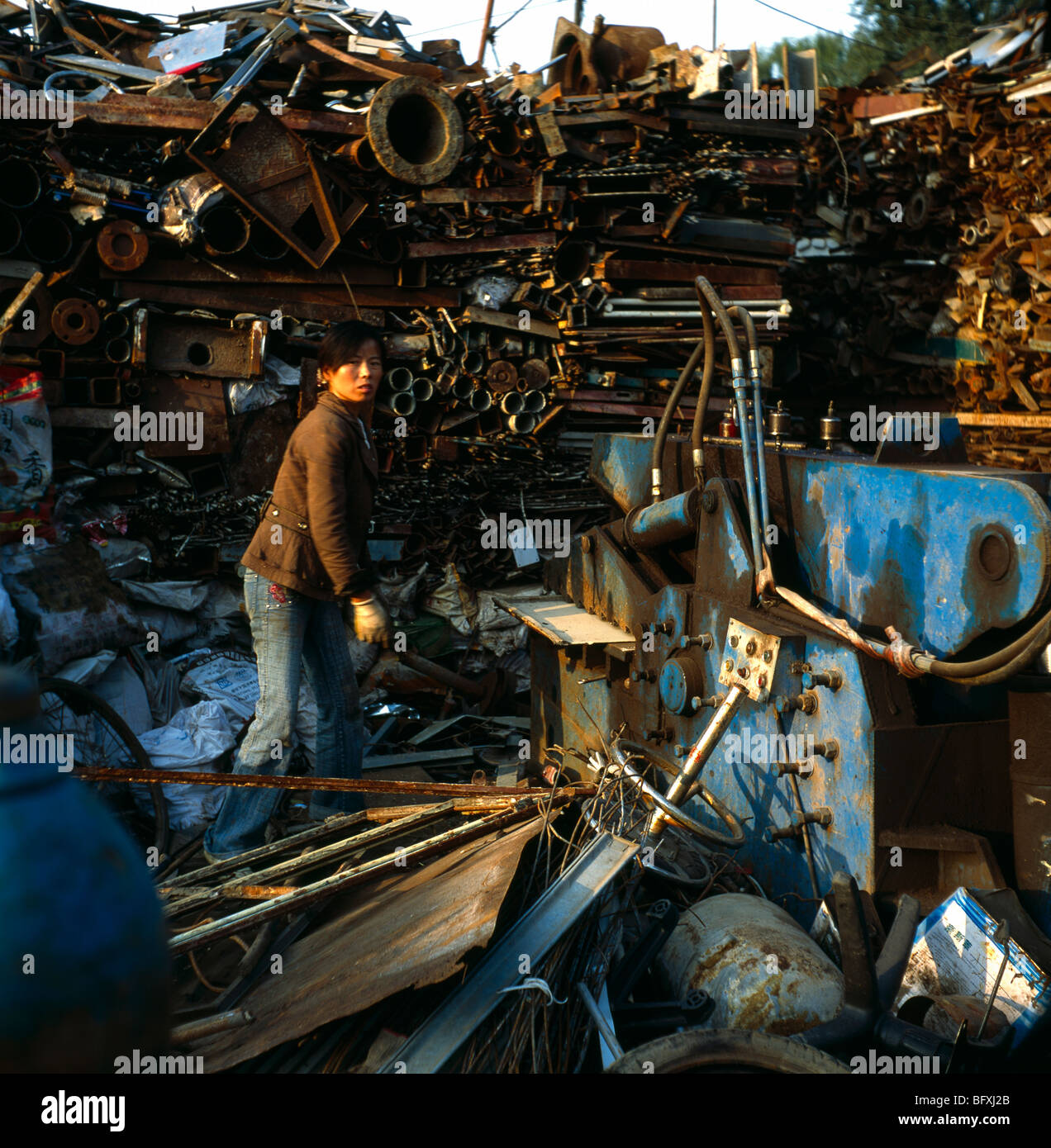 Chinese woman works at scrap metal yard in Beijing, China. 2009 Stock ...