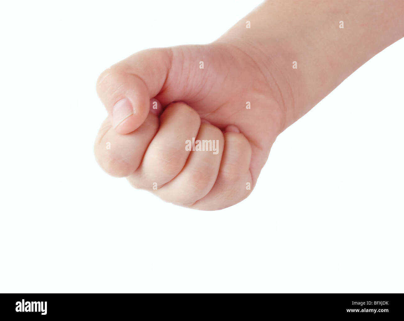 Close up of a child's fist on white background Stock Photo - Alamy