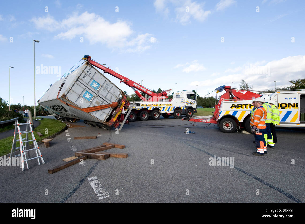 Overturned lorry being rescued by a rescue truck in Leicestershire ...
