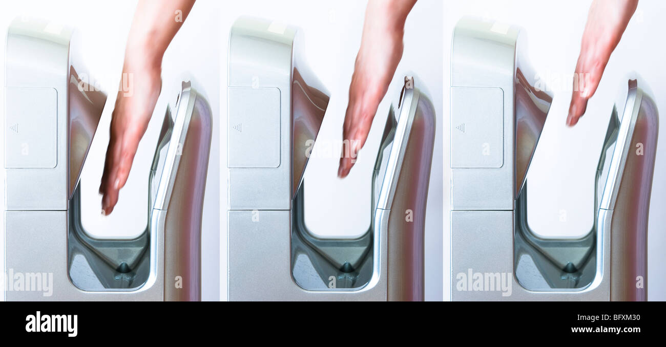 Three images showing hands slowly withdrawing from modern hand dryer ...