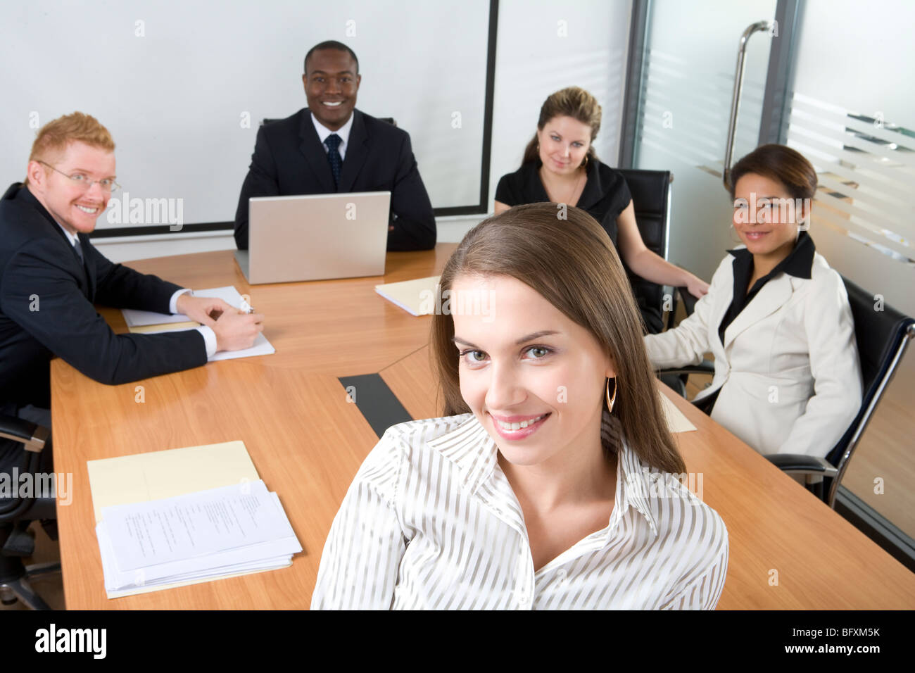 Co-workers in business meeting Stock Photo - Alamy