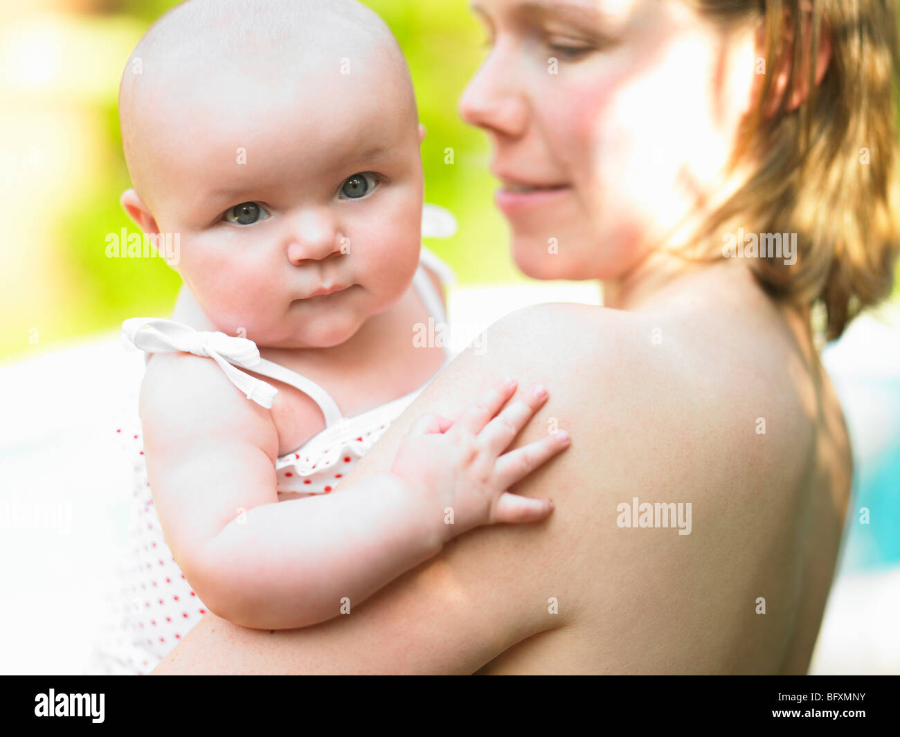 baby in mothers arms Stock Photo - Alamy