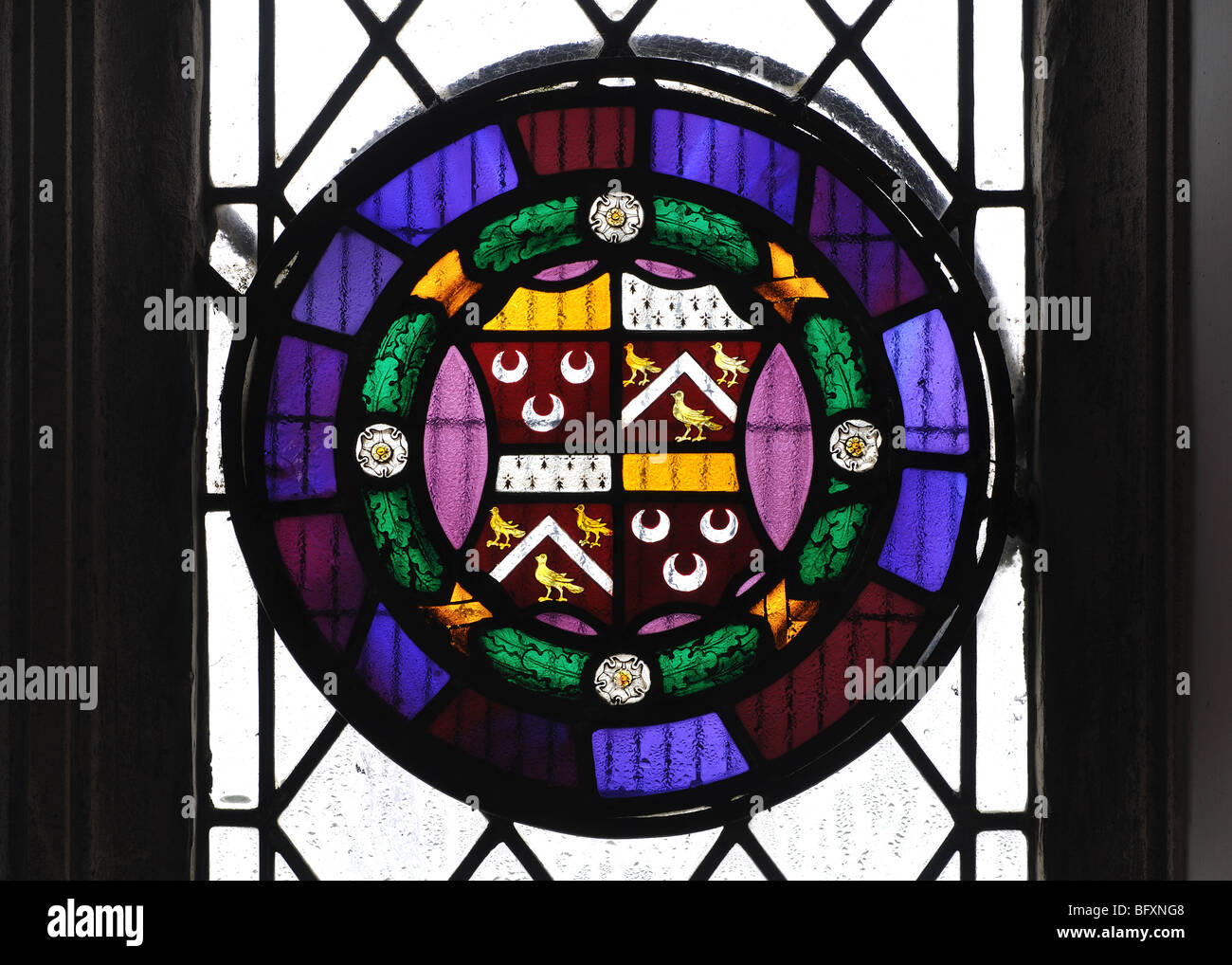 Medieval stained glass roundel in St. Michael`s Church, Begbroke ...