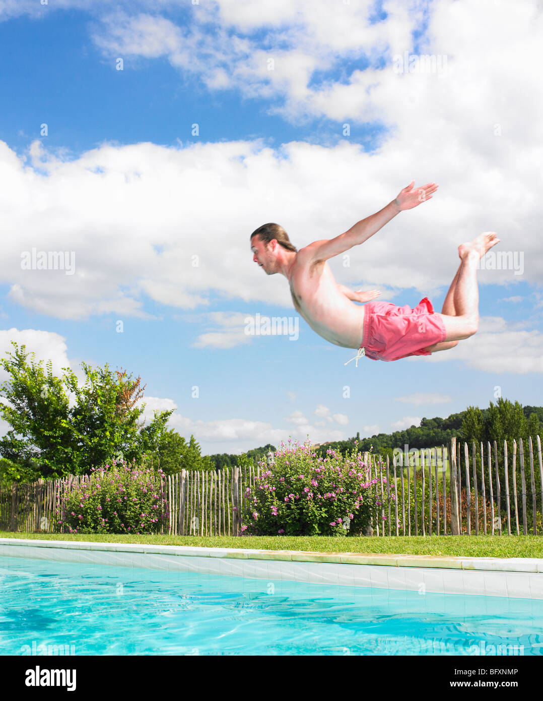 young man diving Stock Photo - Alamy