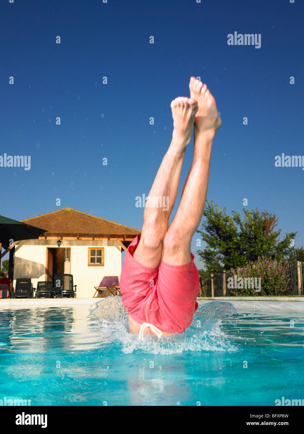 young man diving Stock Photo - Alamy