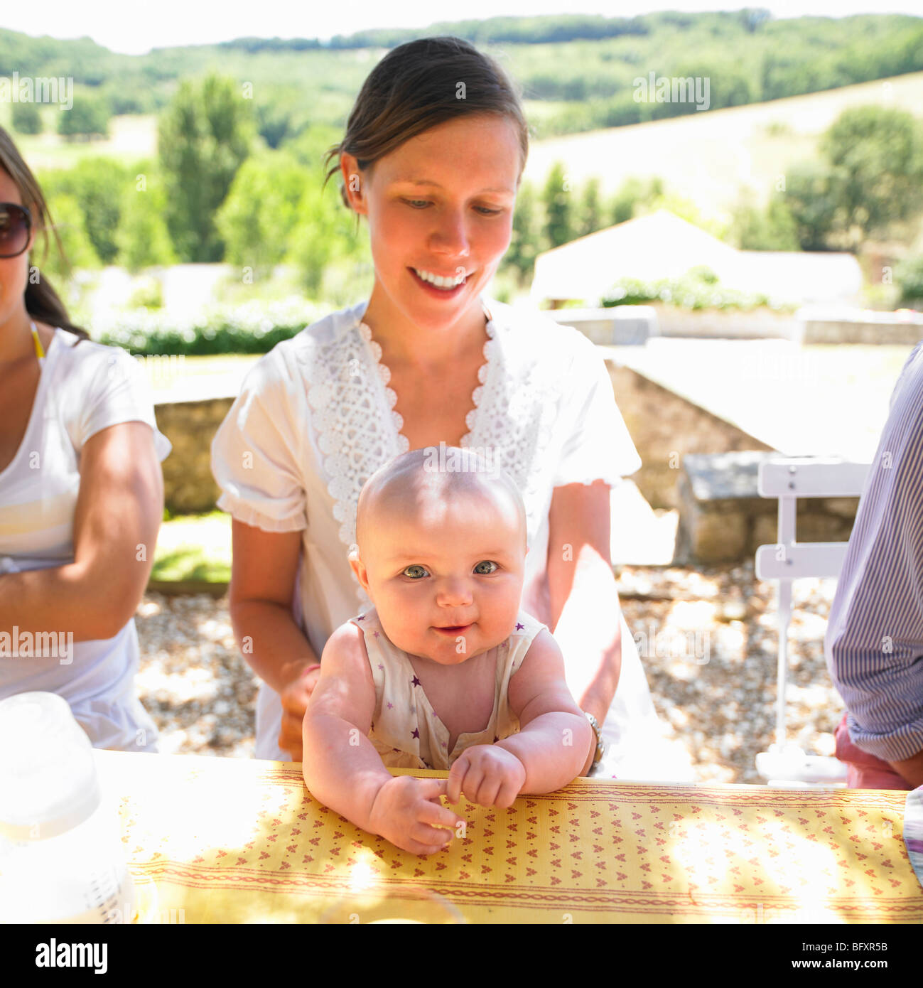 mother and baby at the table Stock Photo - Alamy
