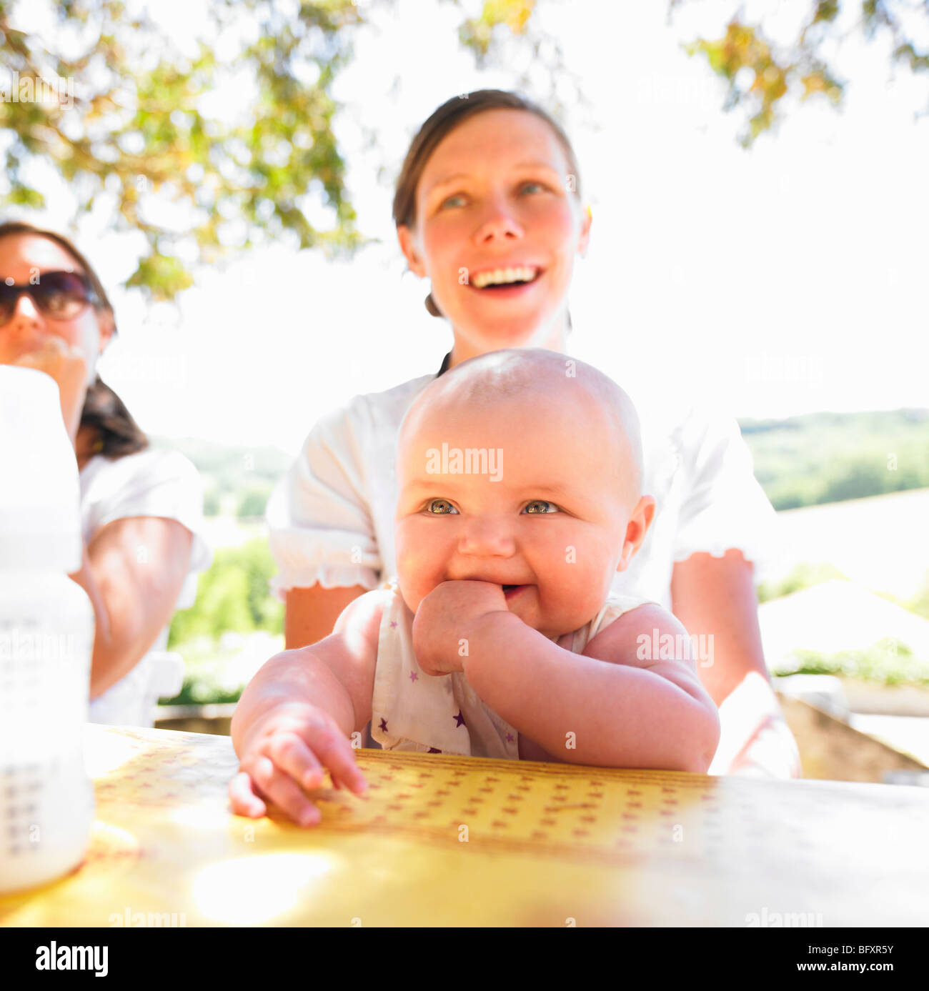 mother and baby at the table Stock Photo - Alamy