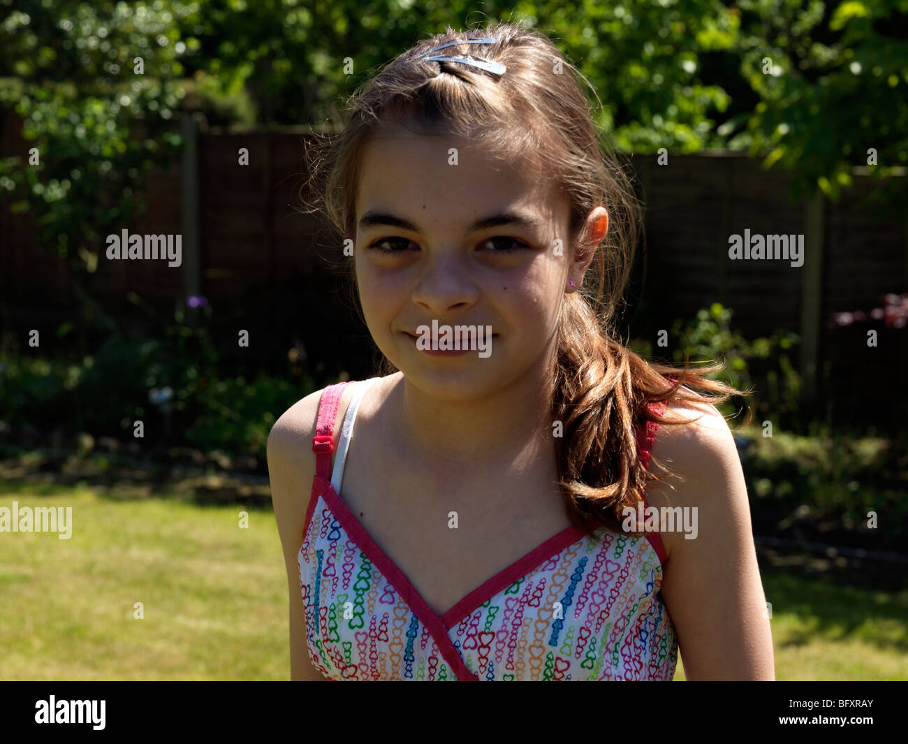 Girl Aged 12 in a Garden Stock Photo - Alamy