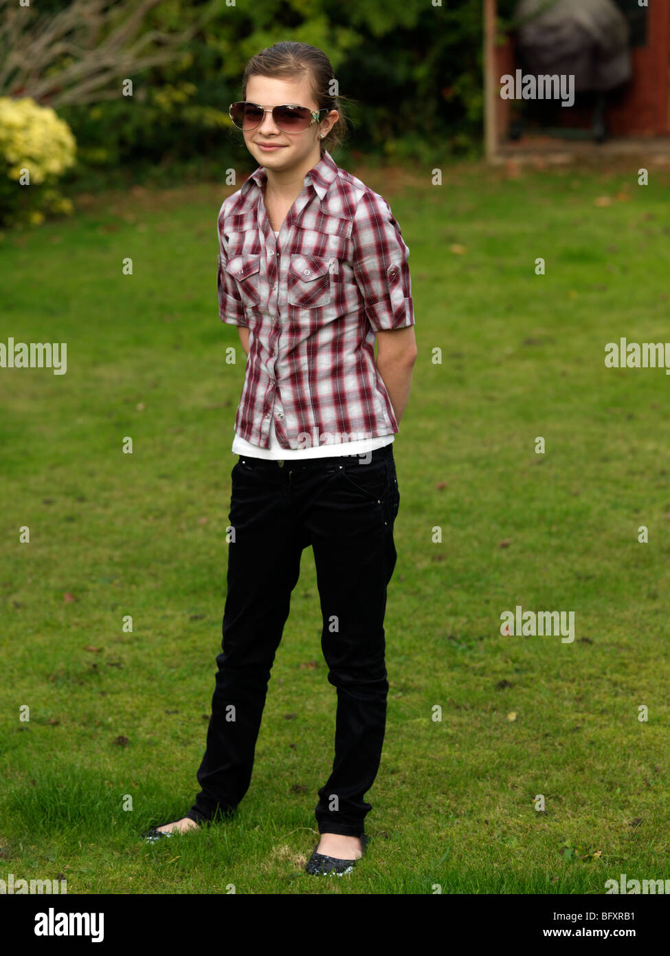Girl Aged 12 in a Garden Stock Photo - Alamy