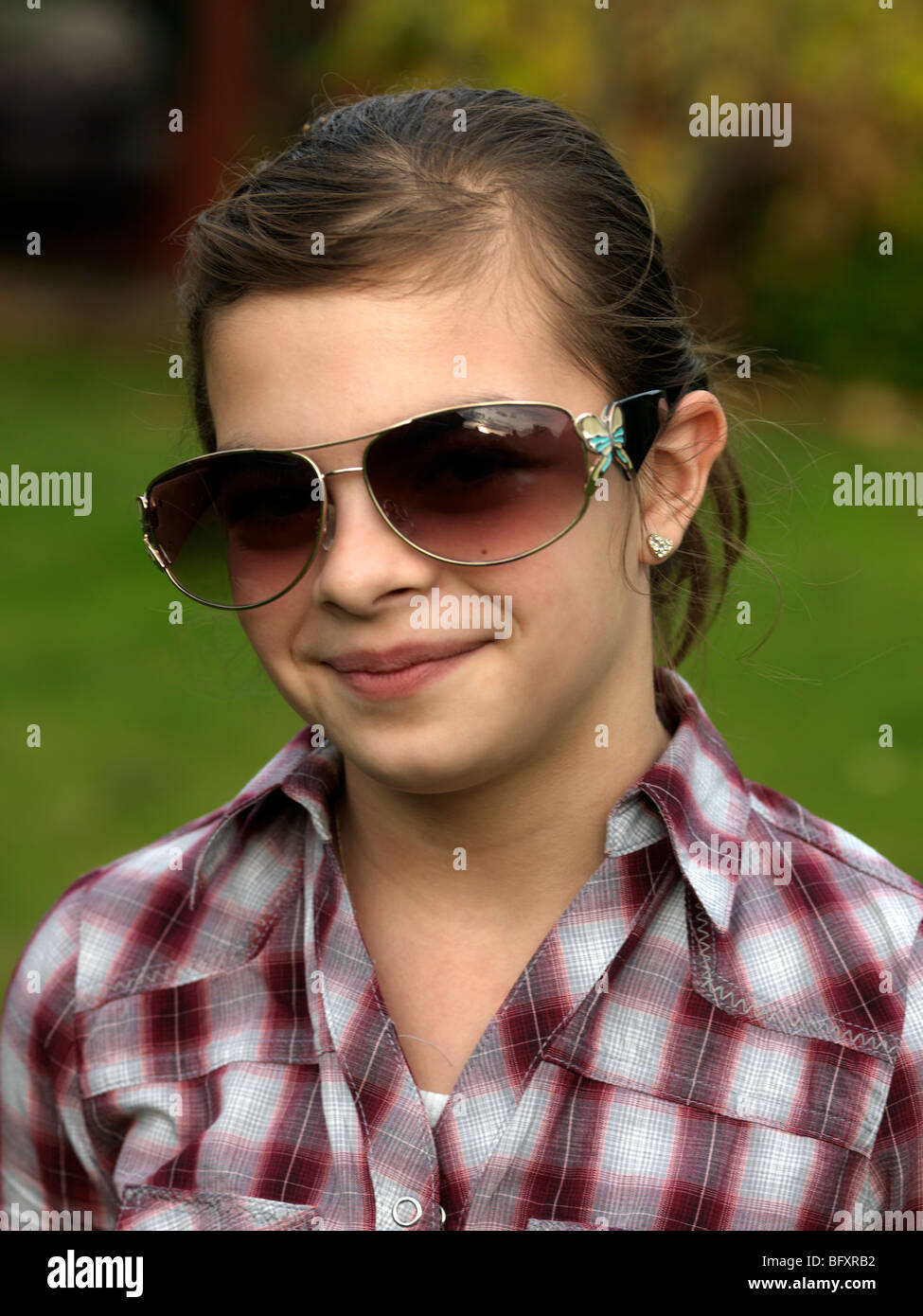 Girl Aged 12 in a Garden Stock Photo - Alamy