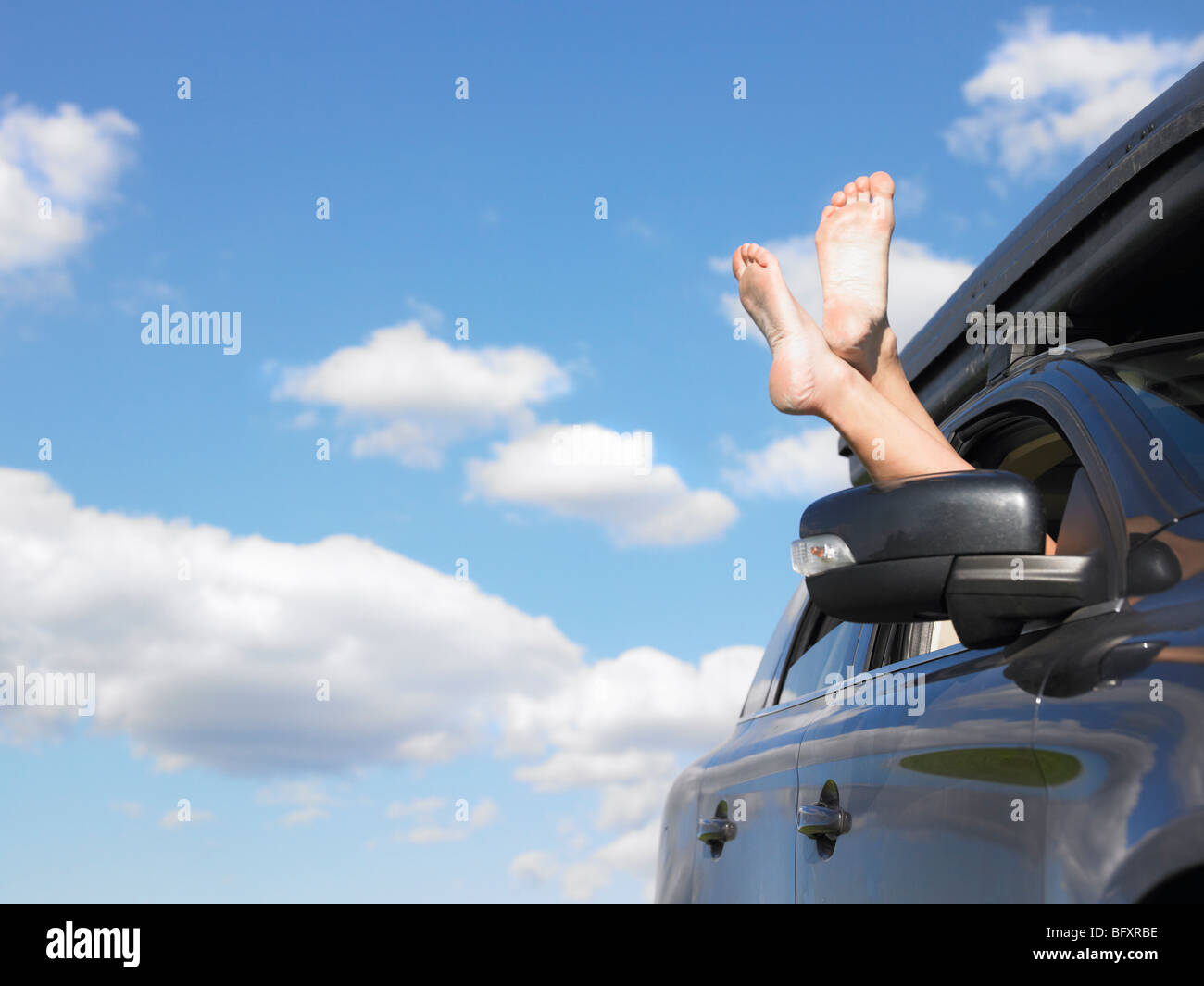 Feet out car window hi-res stock photography and images - Alamy