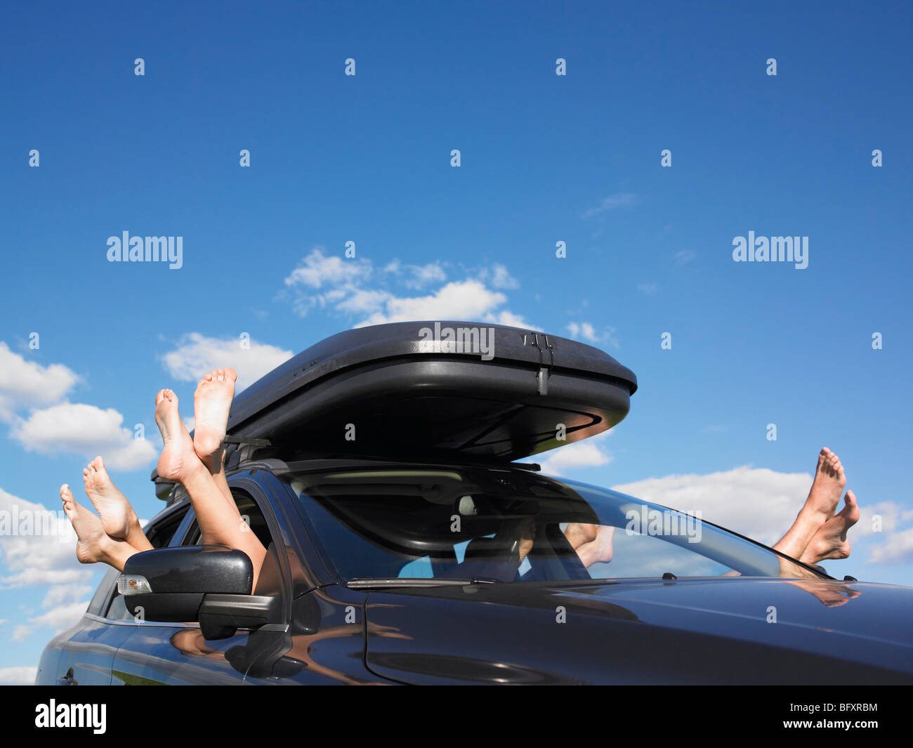 feet out of car window Stock Photo - Alamy