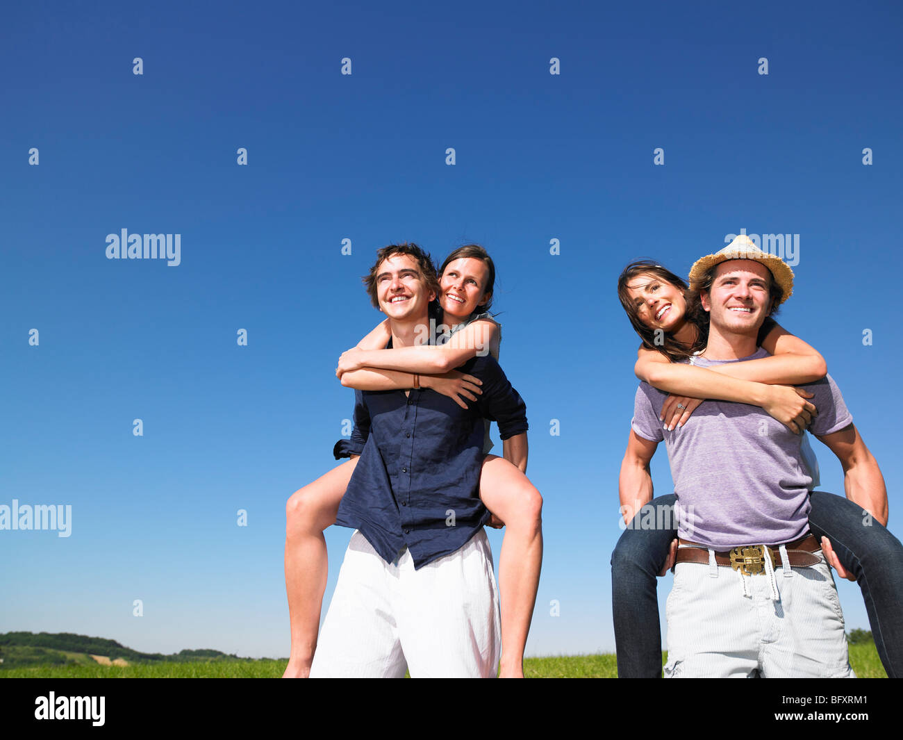 Woman riding piggyback hi-res stock photography and images - Alamy