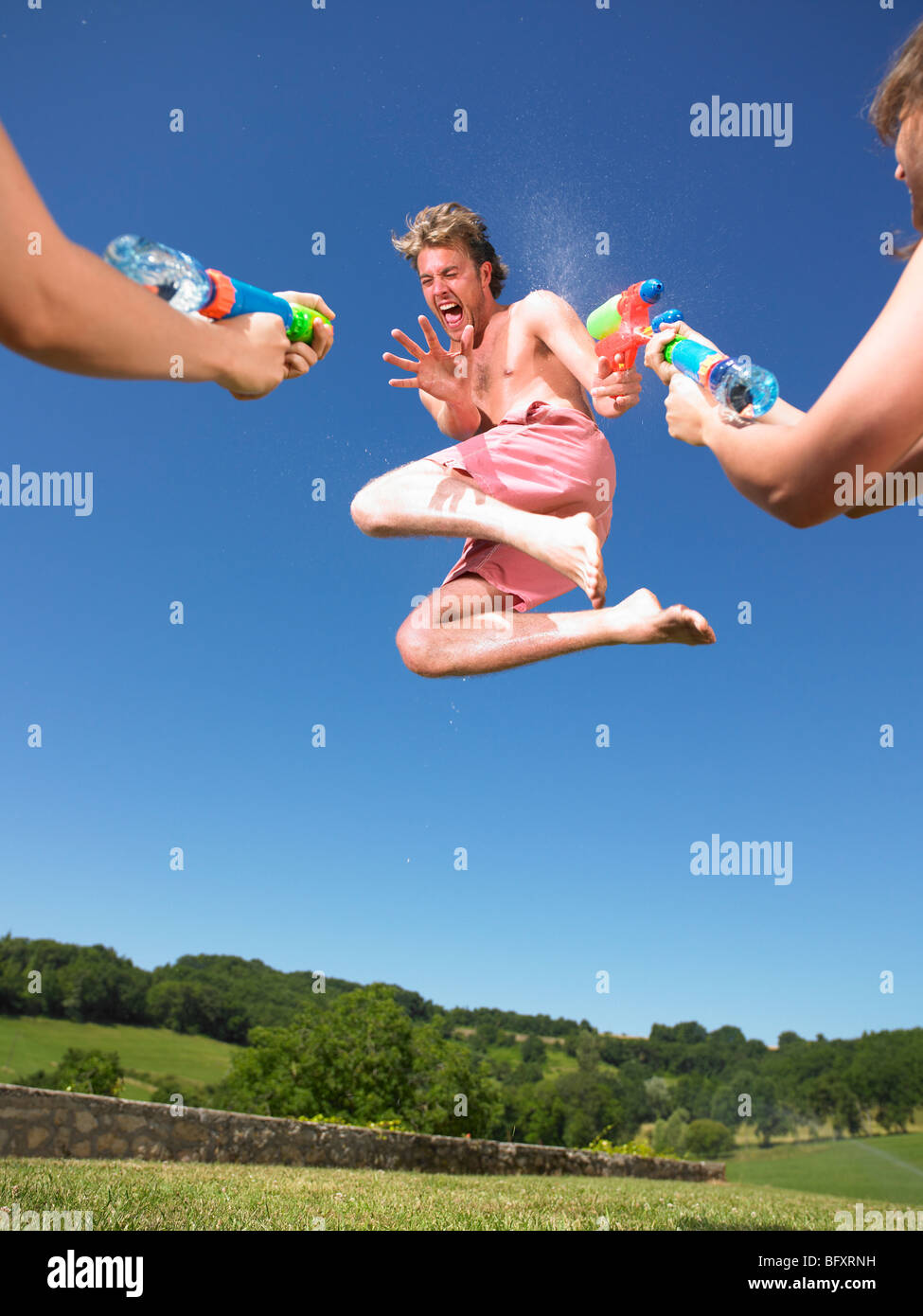 water fight Stock Photo - Alamy