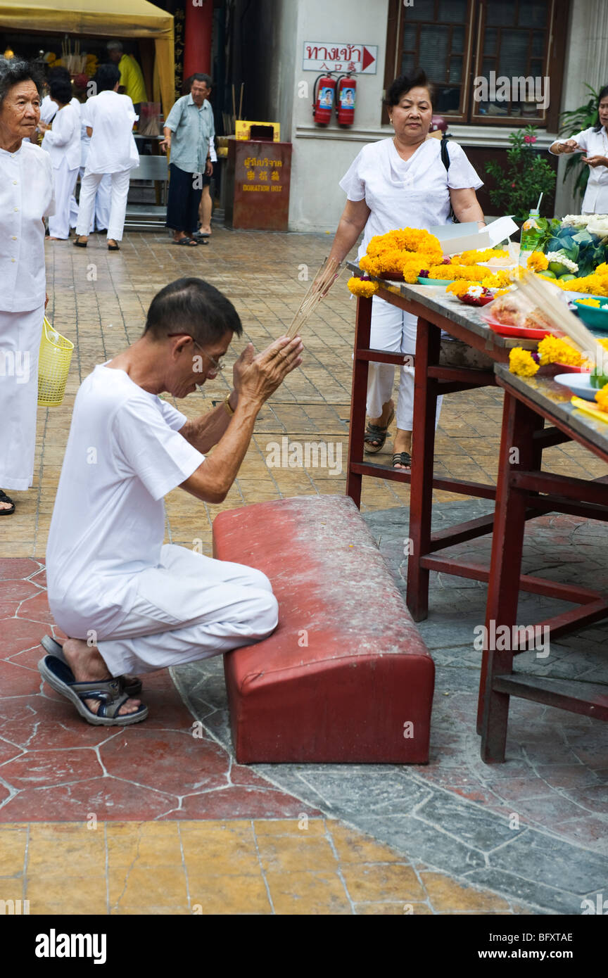 people praying at chinese temple during vegetarain festival in china ...